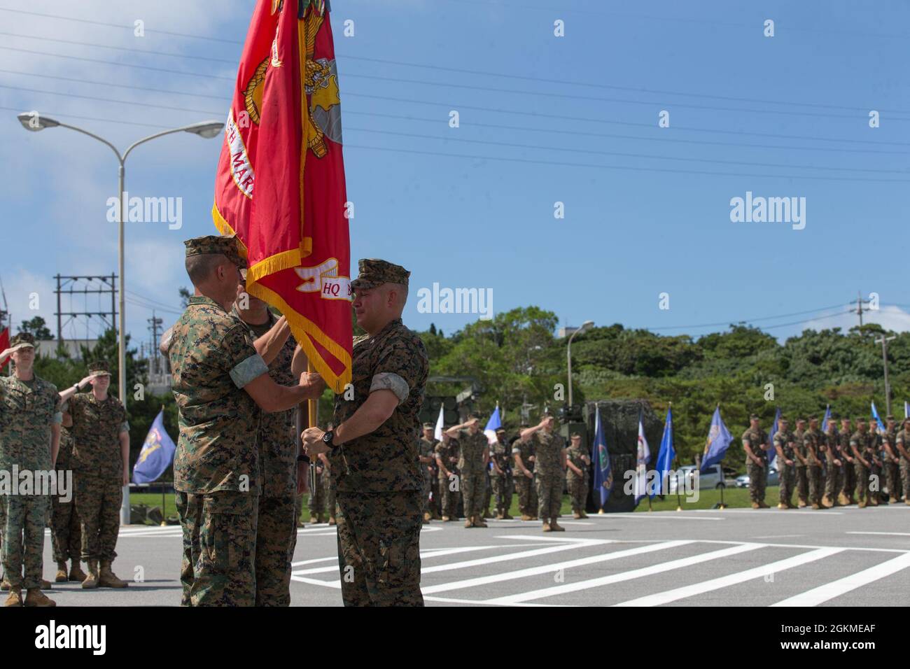 U.S. Marine Corps Col. Nick Sims (left), incoming commanding officer of ...