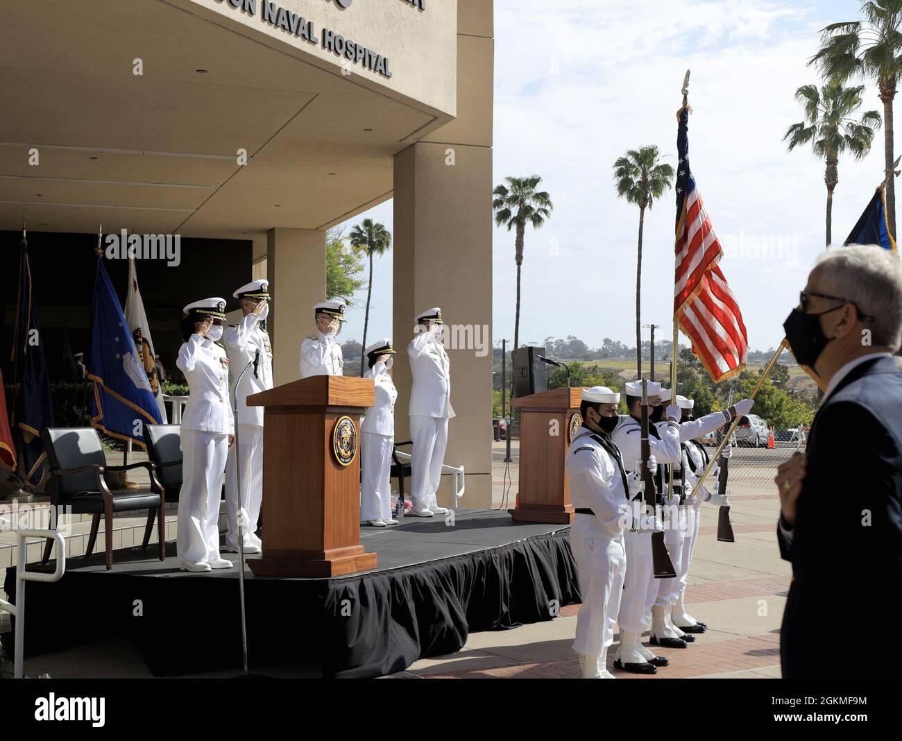 The official party salutes the American flag at the Navy Medicine ...