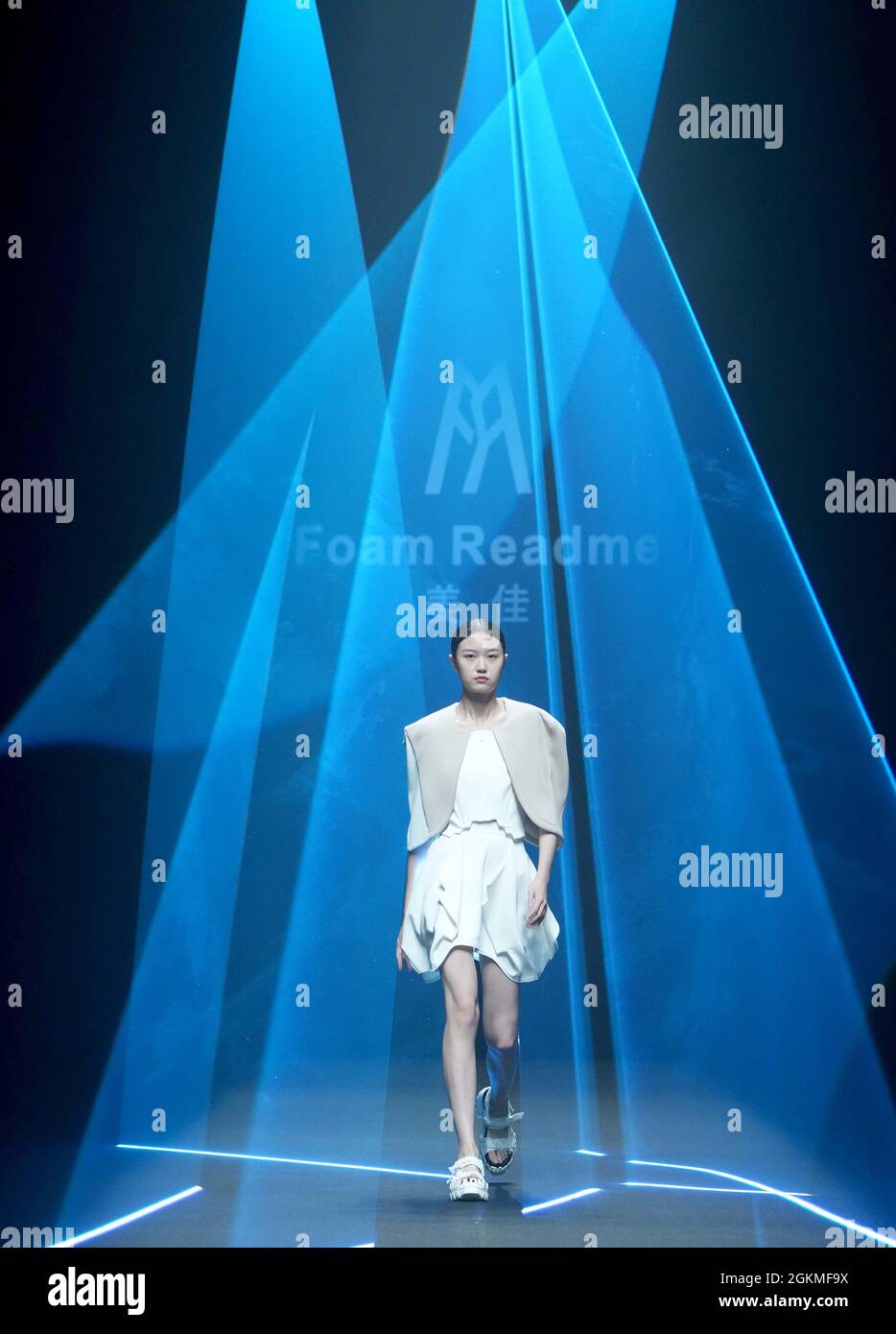 Beijing, China. 12th Sep, 2021. A model presents creations by designer ...