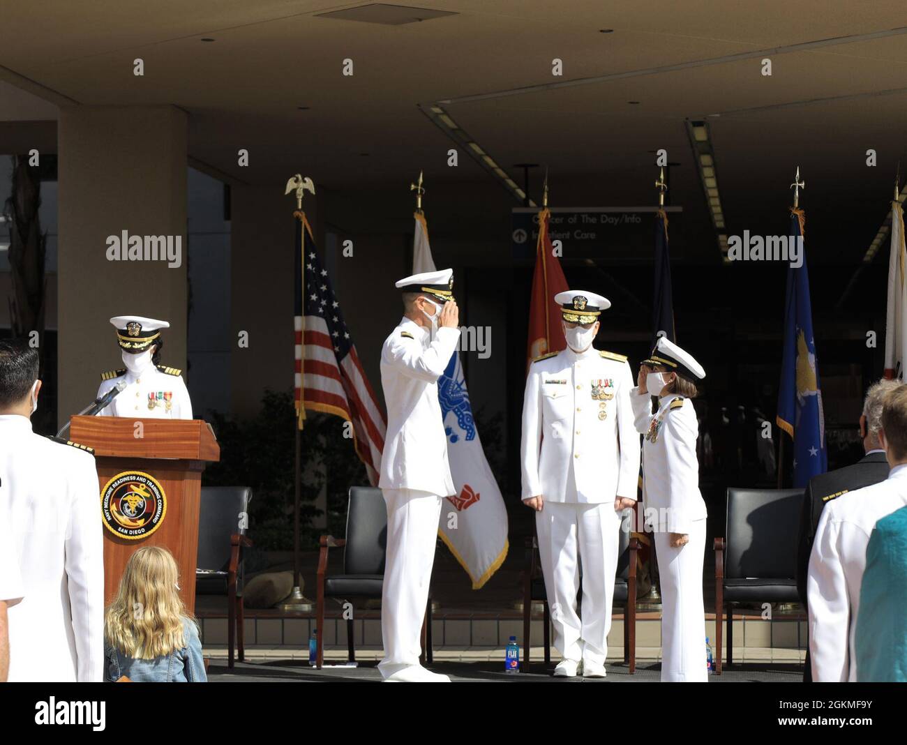 Capt. Devin Morrison salutes Capt. Kimberly Davis as she takes the helm ...