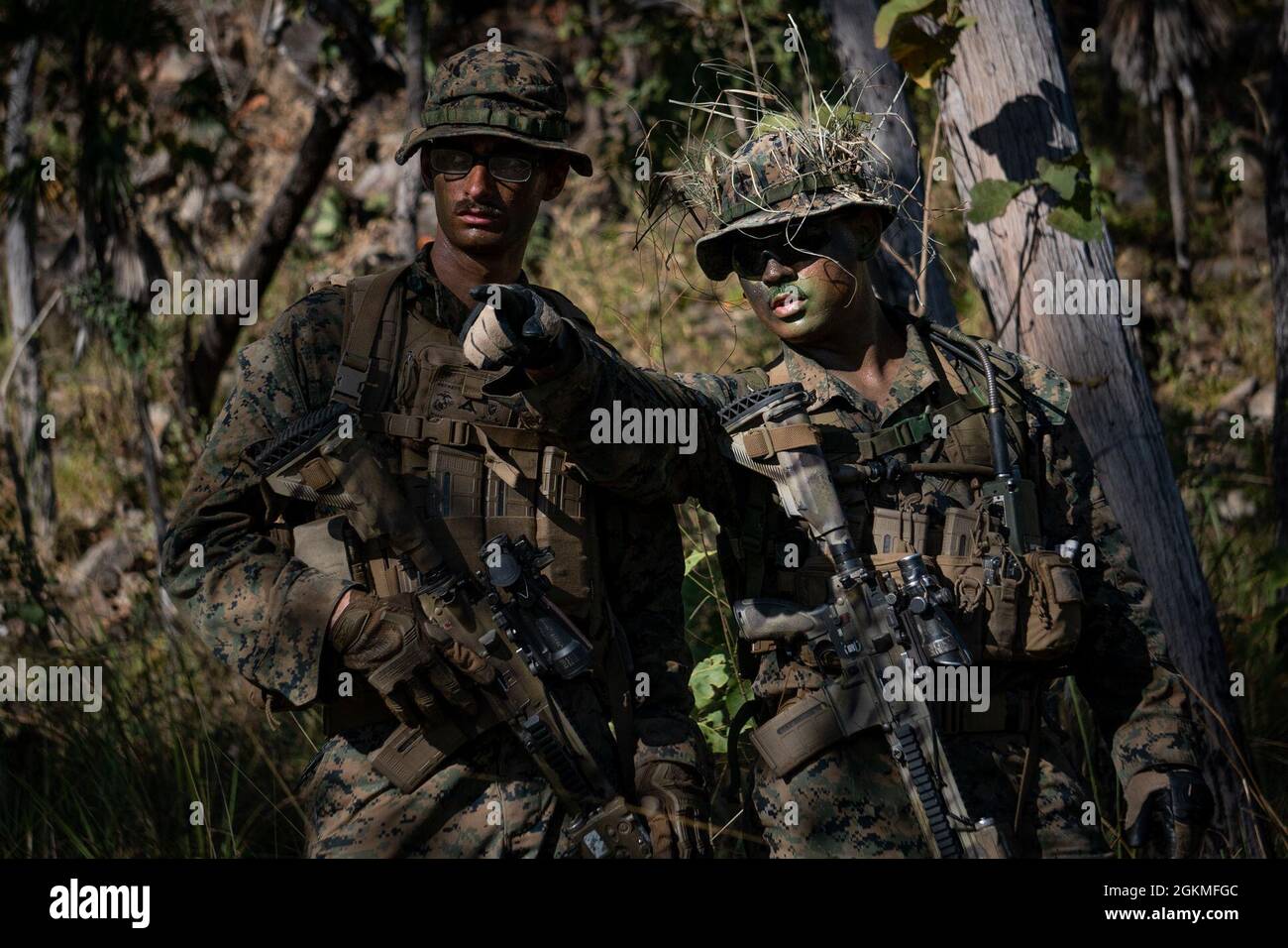 U.S. Marine Corps Sgt. Melvin Paniagua, a platoon sergeant, directs ...