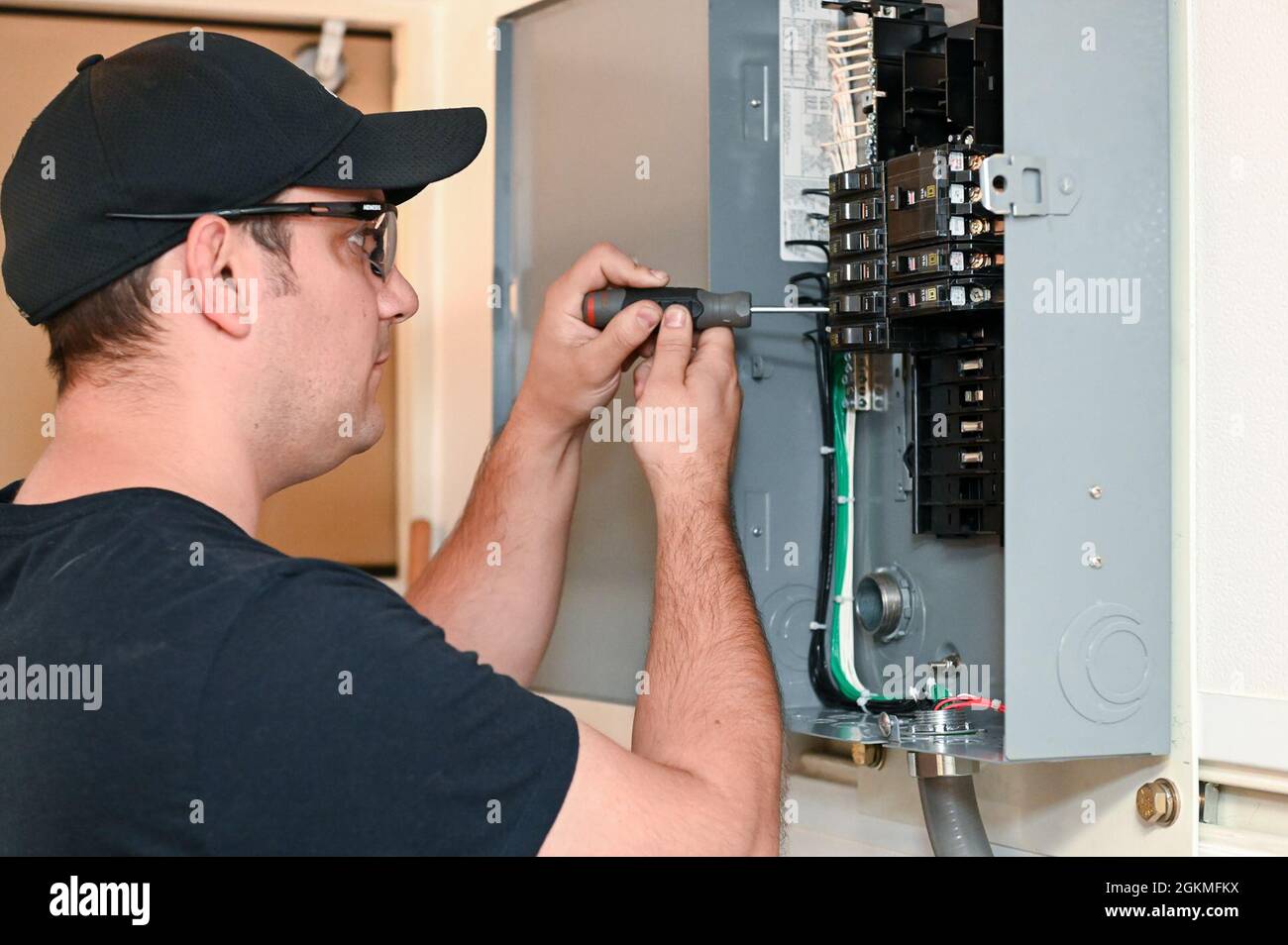 Trevor Lutz performs electrical work on the ARSS V2, a transportable ...