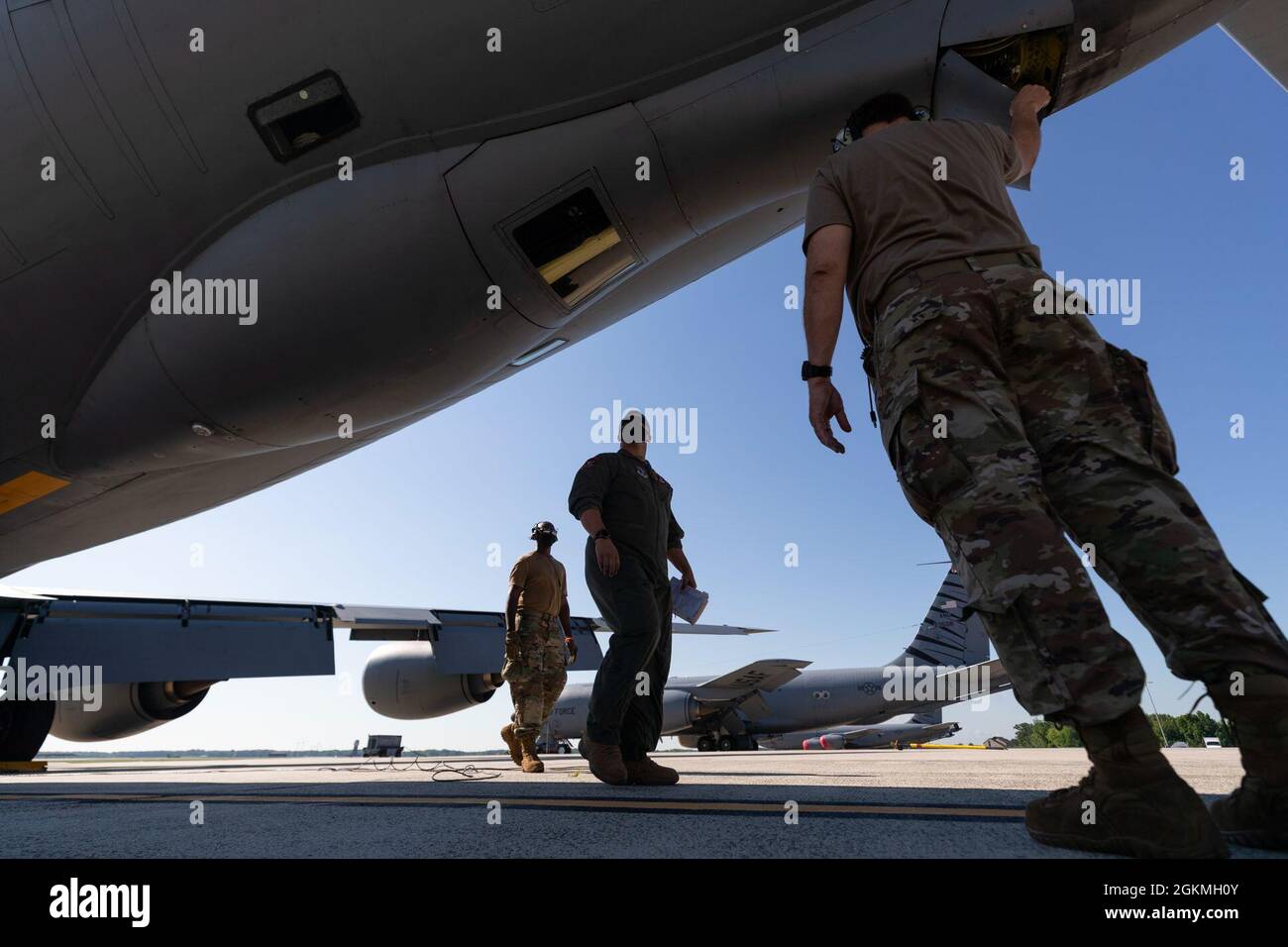 U.S. Air Force Lt. Col. Matthew Brito, center, a KC-135R Stratotanker ...
