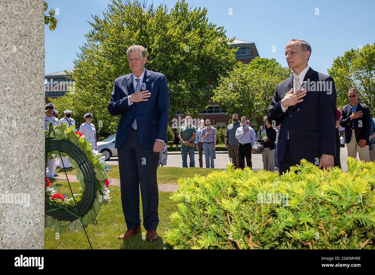 Rhode Island Gov. Dan McKee (from left) and Naval Undersea Warfare ...