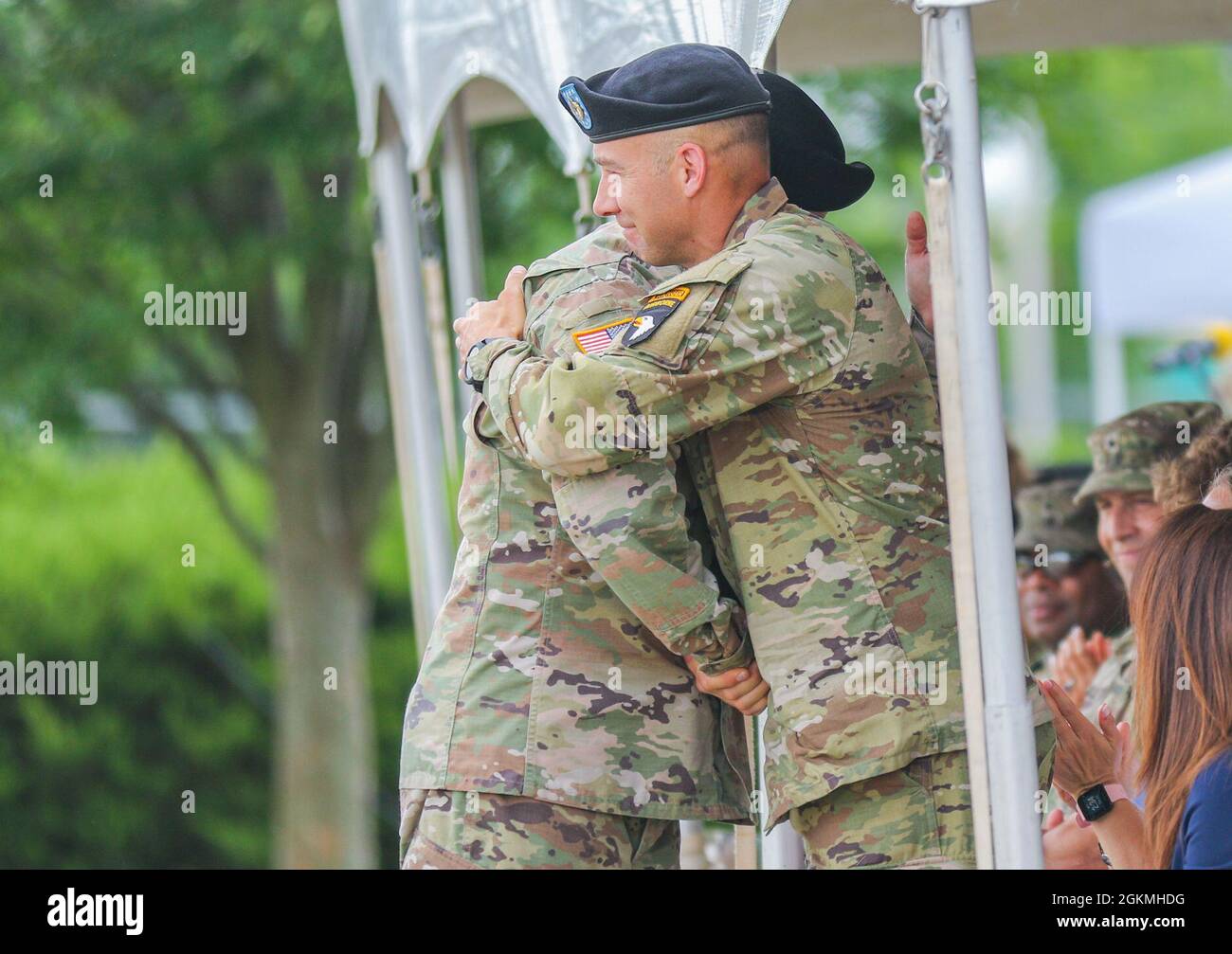 Maj. Gen. JP McGee, commanding general of the 101st Airborne Division (Air Assault), embraces ...