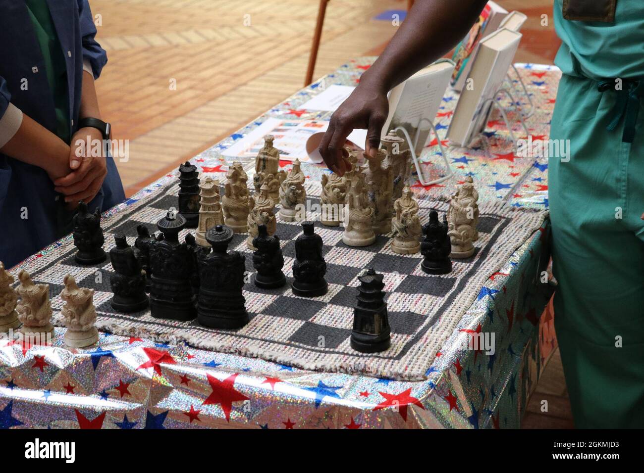 U.S. Air Force Capt. Suji Yoon, Brooke Army Medical Center perioperative nurse, left, and Capt ...