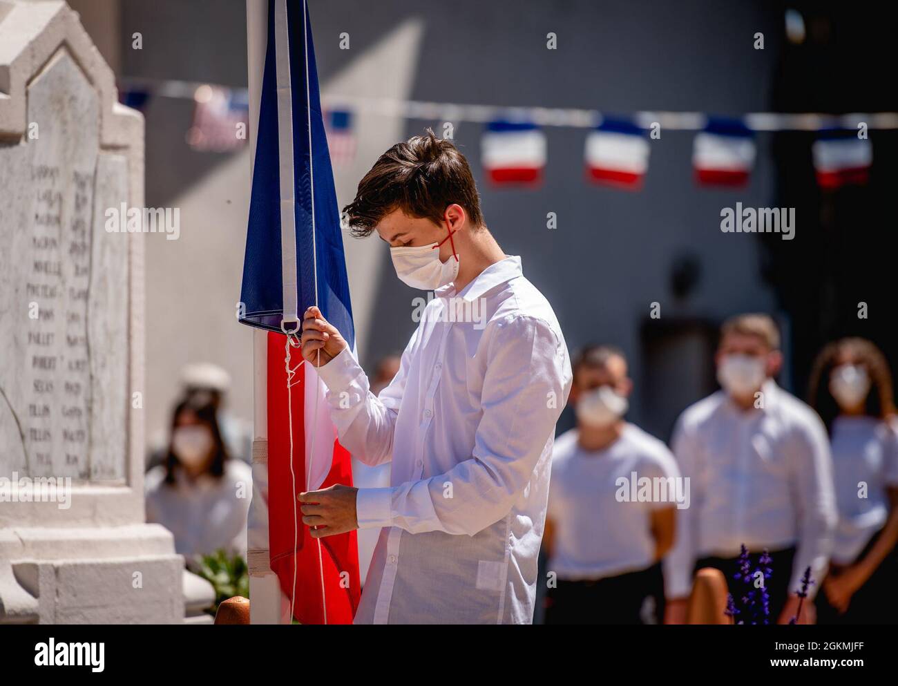 A student of Elie Faure College in Sainte-Foy-la-Grande, raises the ...