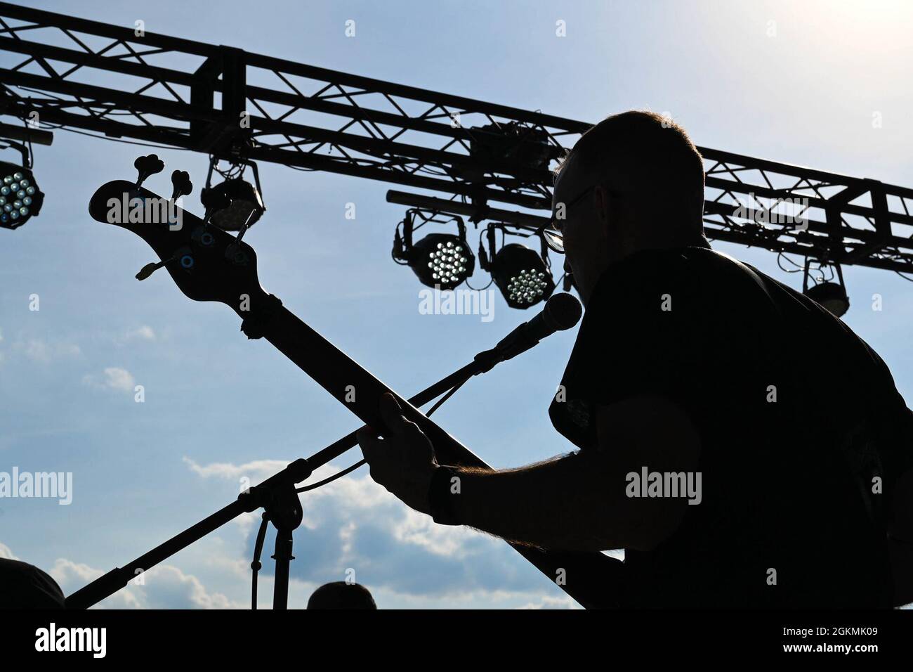 A member of the U.S. Army Training and Doctrine Command Band, sings ...