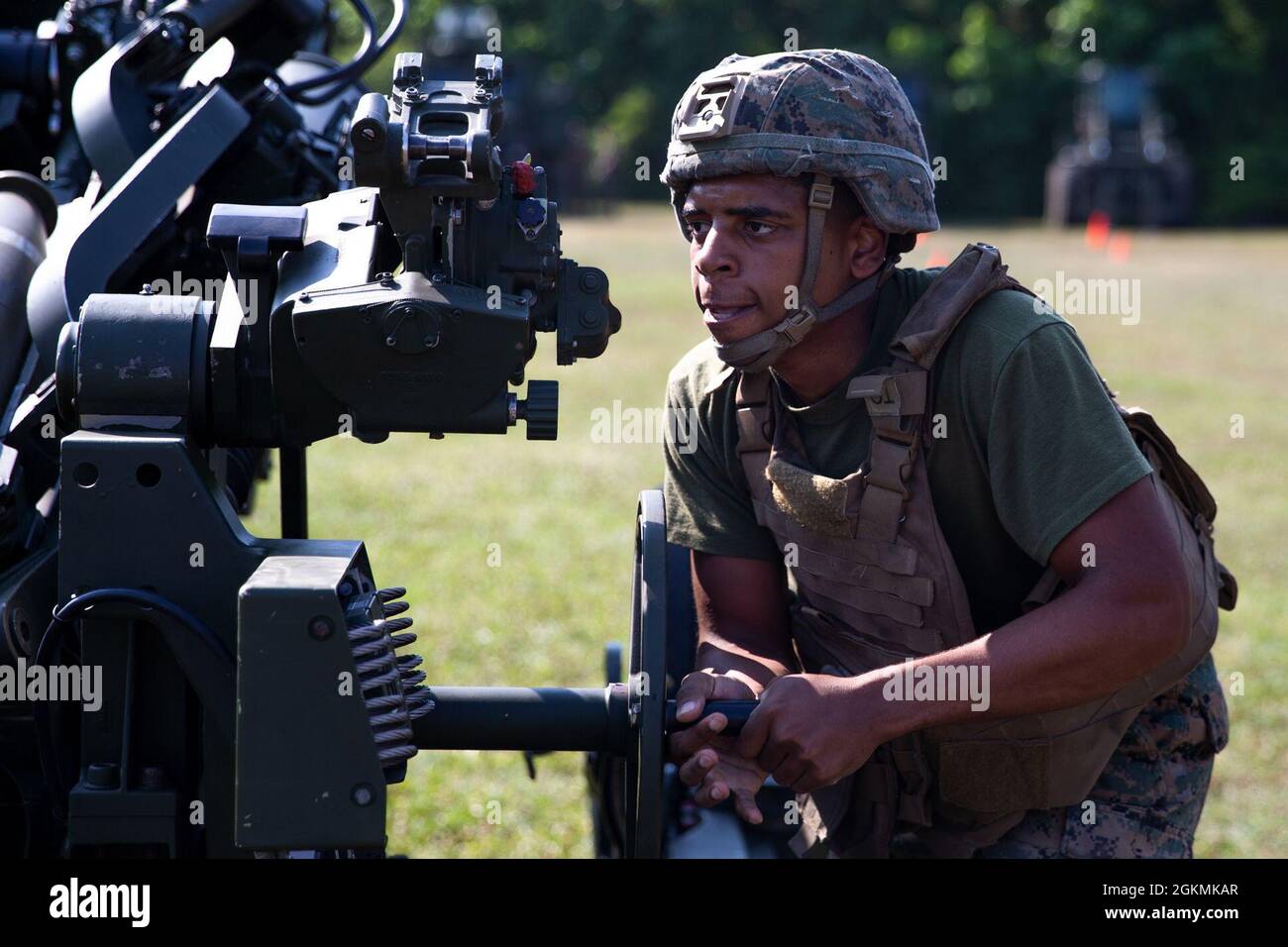 U.S. Marine Corps Cpl. Alim Abraham, an assistant gunner with 2d ...