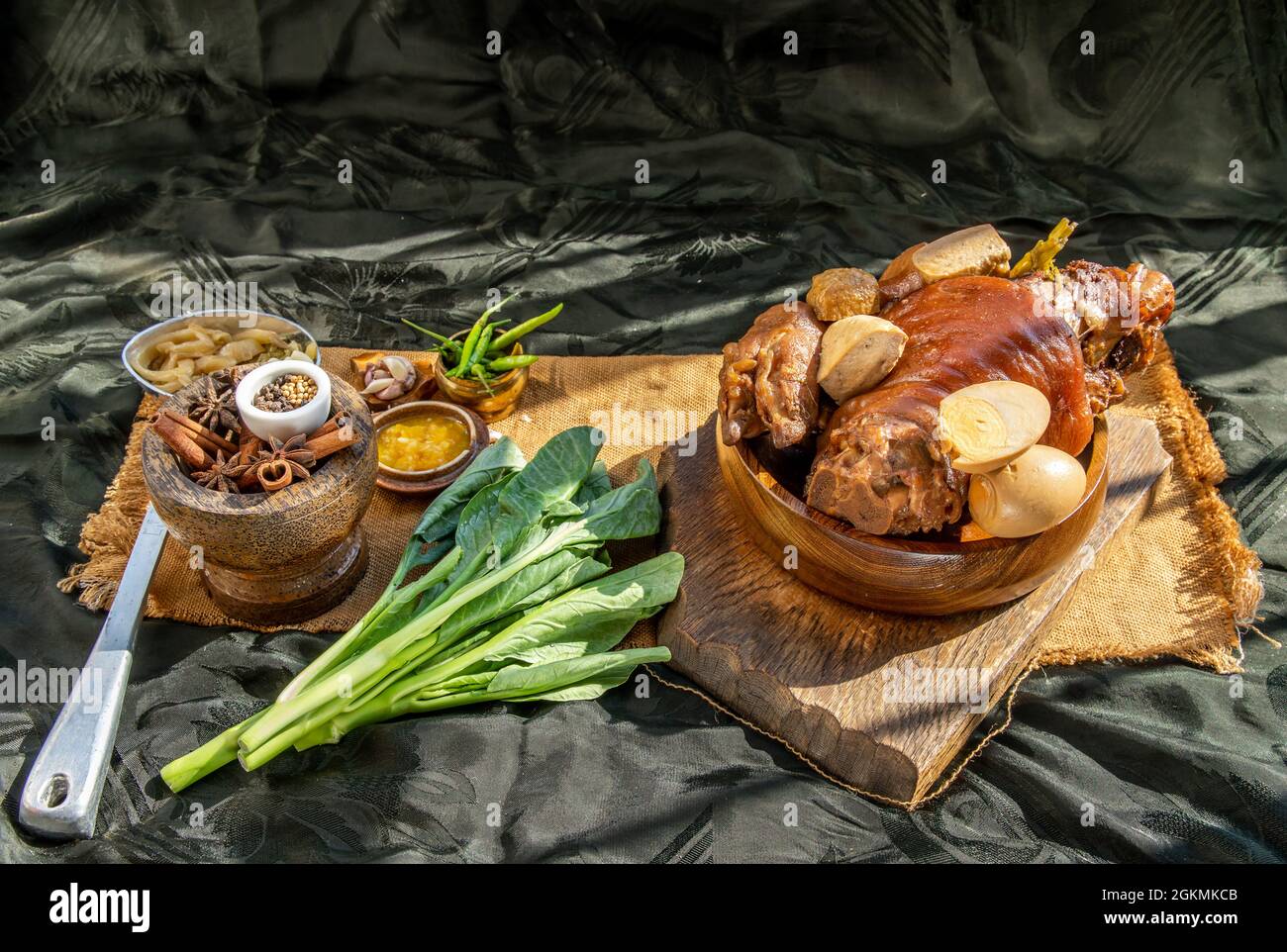 Chinese traditional dish Stewed pork leg with boiling sweet gravy sauce ...