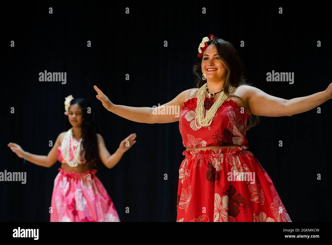 Christy Lawson and Emilee Natalicio perform a traditional Guamanian ...