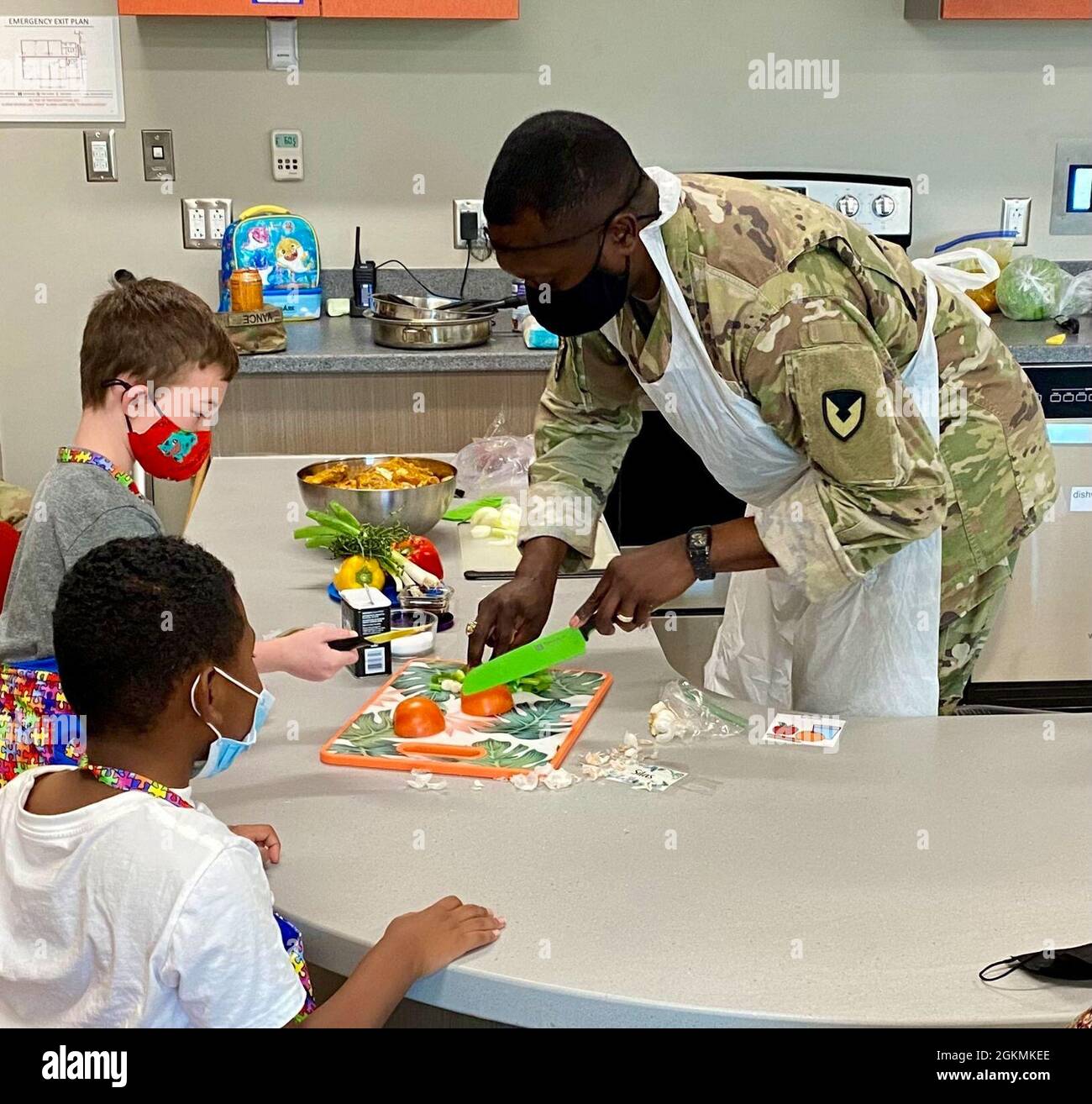 Garrison Command Sgt. Maj. Algrish Williams prepares Jamaican curry ...