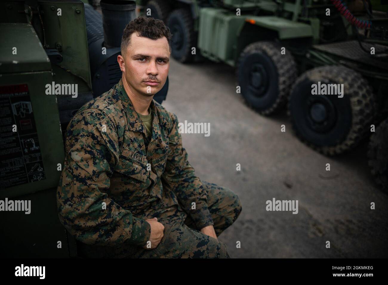 U.S. Marine Corps Cpl. Joshua Vargas, a wrecker operator, poses for a ...