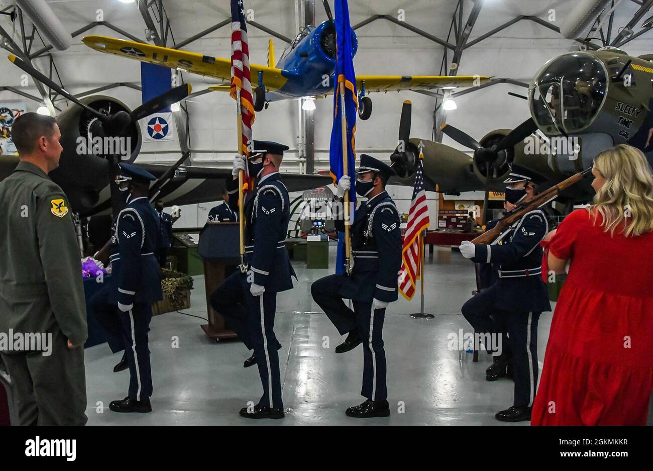 Members of the Dover Air Force Base Honor Guard flag detail perform ...