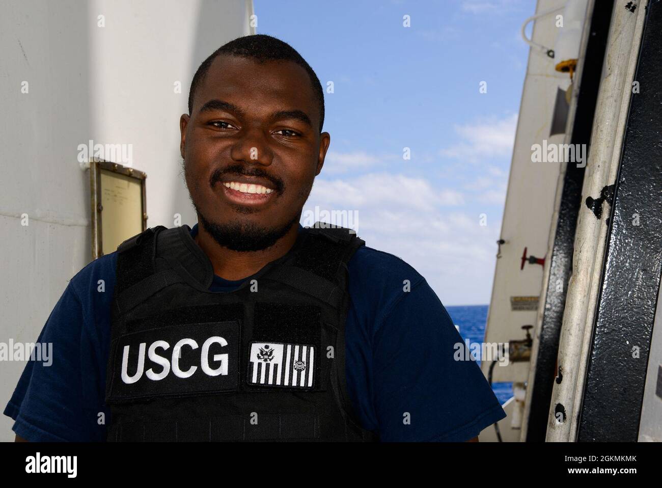 Petty Officer 3rd Class Marcus J. Roberts is a combat information ...