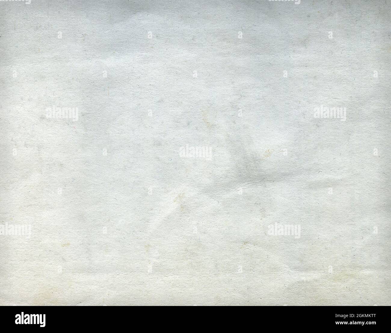 Old wrinkled dirty grey paper sheet for background. Closeup Stock Photo ...