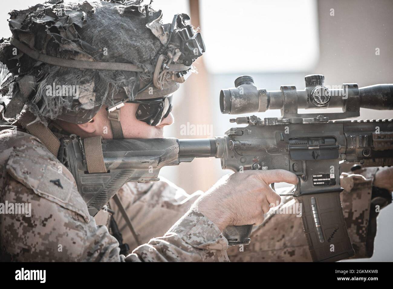 A Designated Marksman (DMs) with 2nd Battalion, 1st Marines, assigned ...