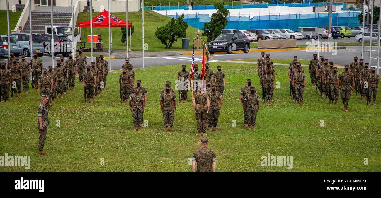 U.S. Marines with Marine Wing Headquarters Squadron (MWHS) 1 stand in ...