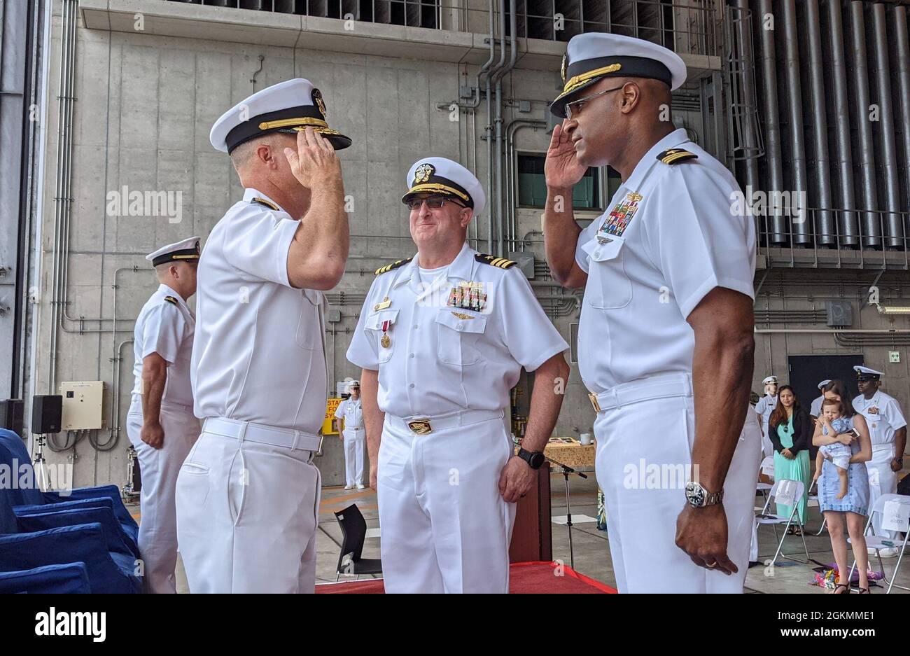 SASEBO, Japan-Cdr. Wilbur Hines salutes Rear Adm. Chris Engdahl as he ...