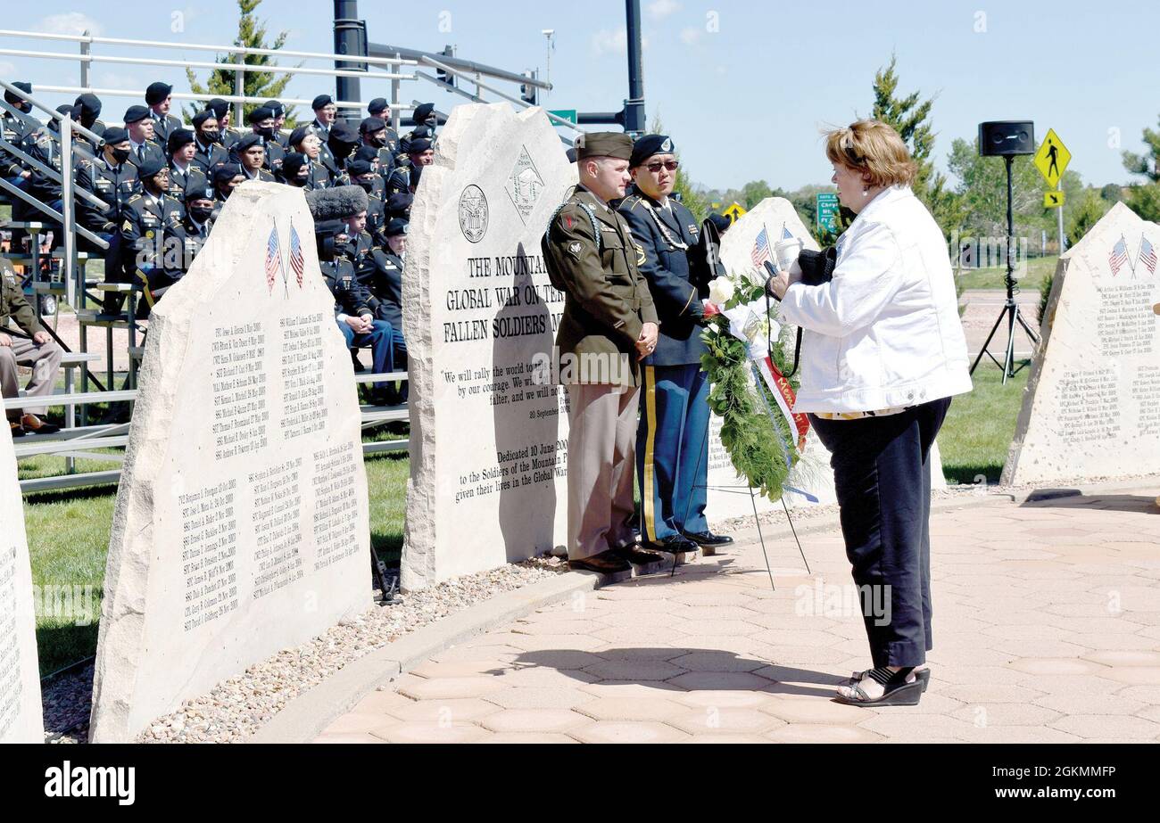 FORT CARSON, Colo. — A Gold Star Family member pays her respects to a ...