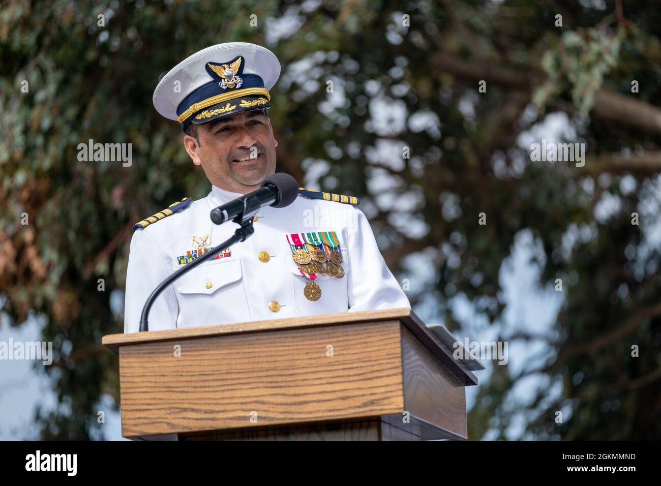 Capt. Jose Peña addresses attendees during a change-of-command ceremony ...