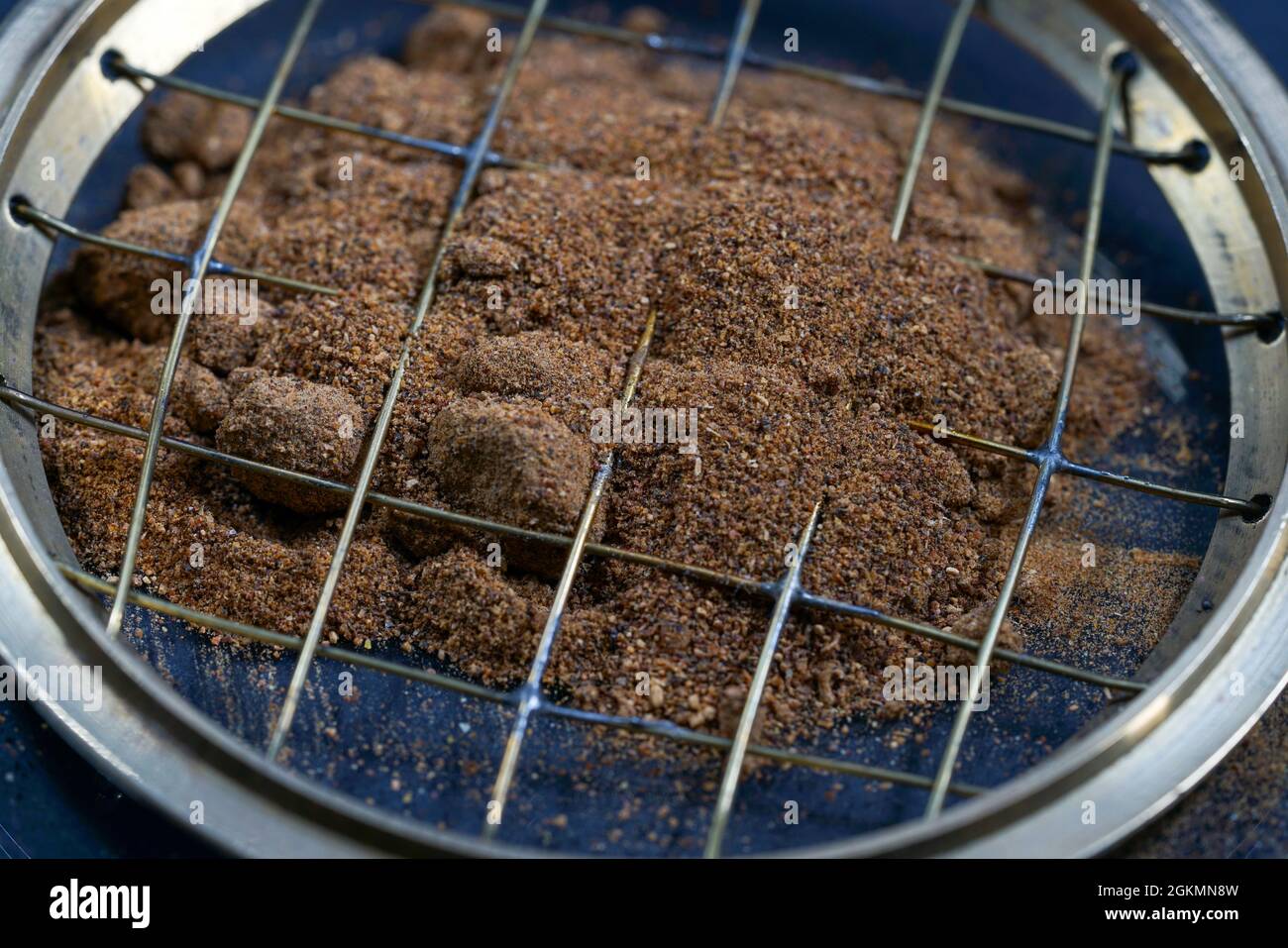 Spices for smoking in the studio photographed with smoke and dark ...