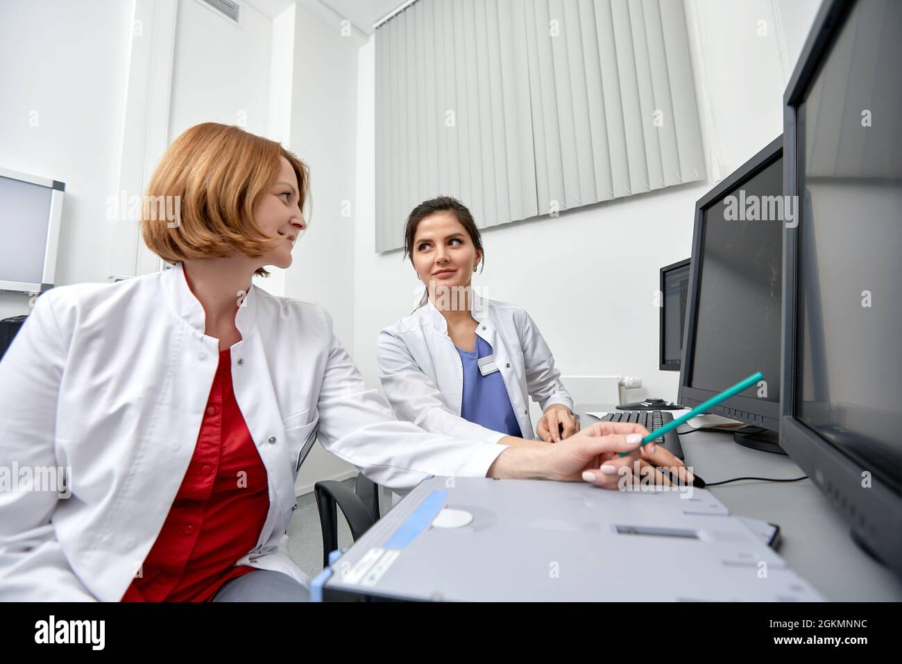 Chest, lung x ray on a doctor's computer screen on a desk. Female ...