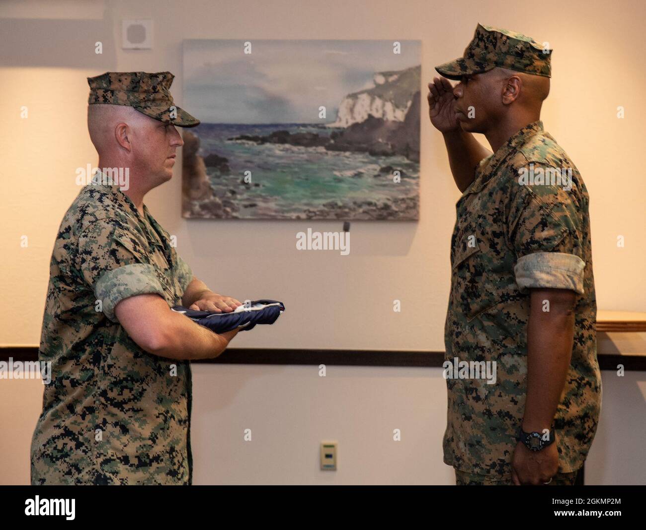 U.S. Marine Corps Gunnery Sgt. Richard Hopkins presents Master Sgt ...