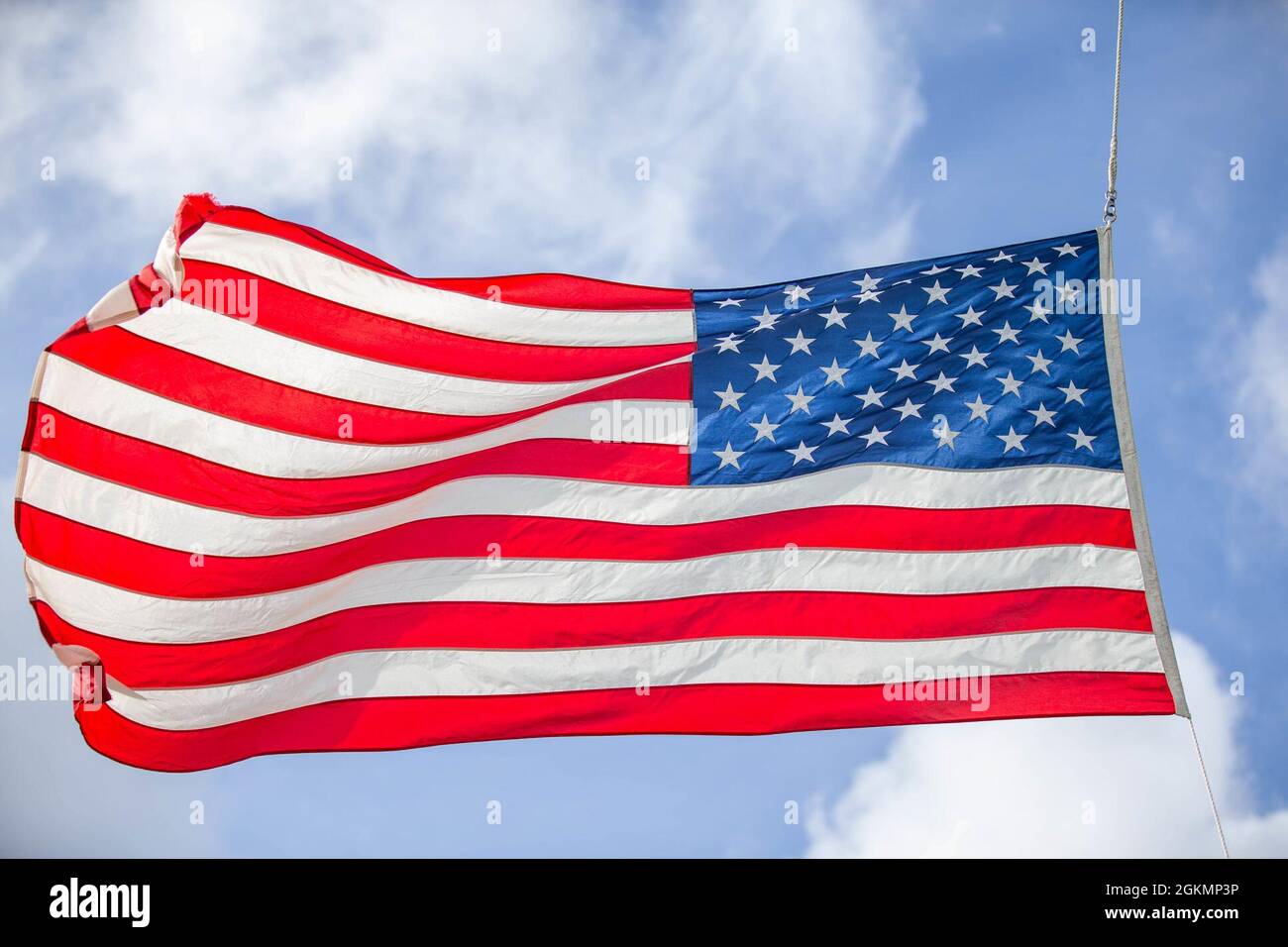 The American Flag rises during Morning Colors at Camp Foster, Okinawa ...