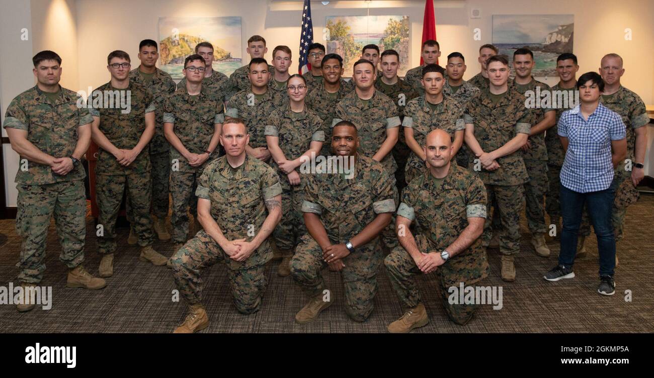 U.S. Marines pose with Master Sgt. Keith Dempsey (ret.) after his ...
