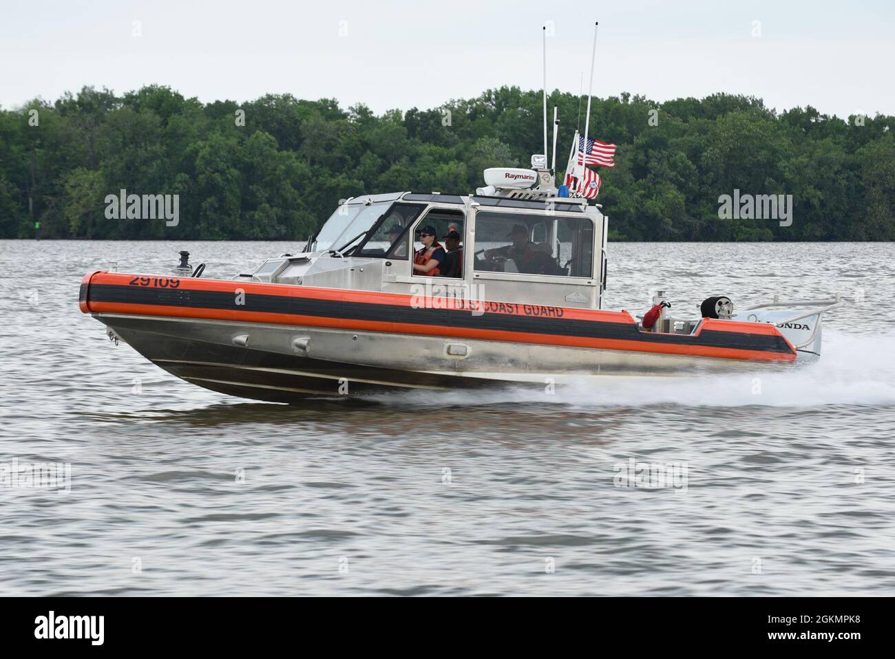 A crew from Coast Guard Station Washington on a 29-foot response boat ...