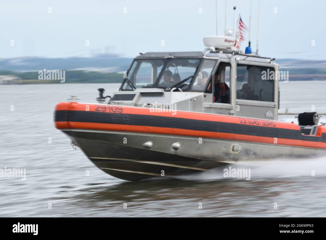 A crew from Coast Guard Station Washington on a 29-foot response boat ...