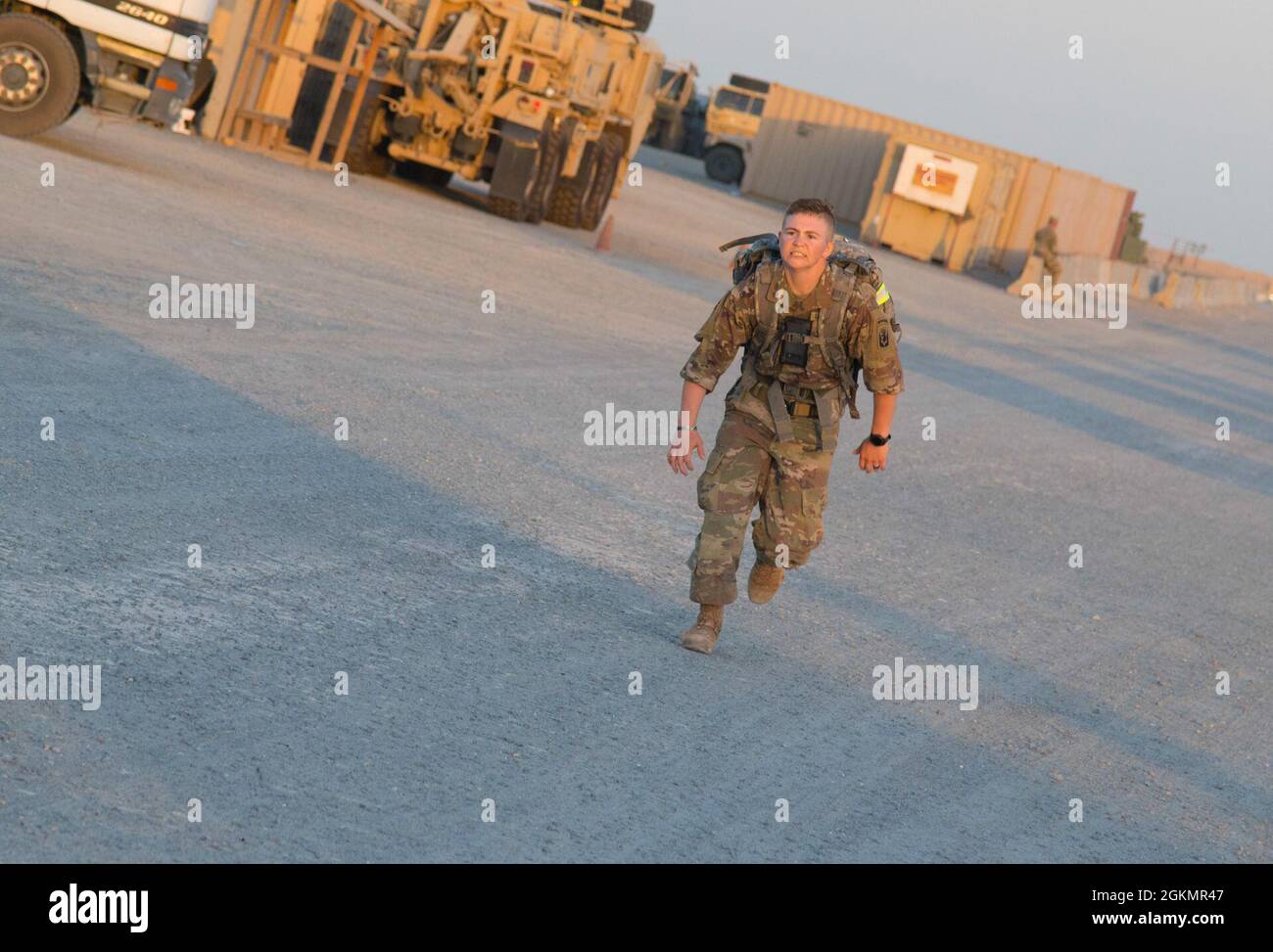 U.S. Army Spc. Sarah Rathbun, Task Force Avalanche, sprints toward the ...