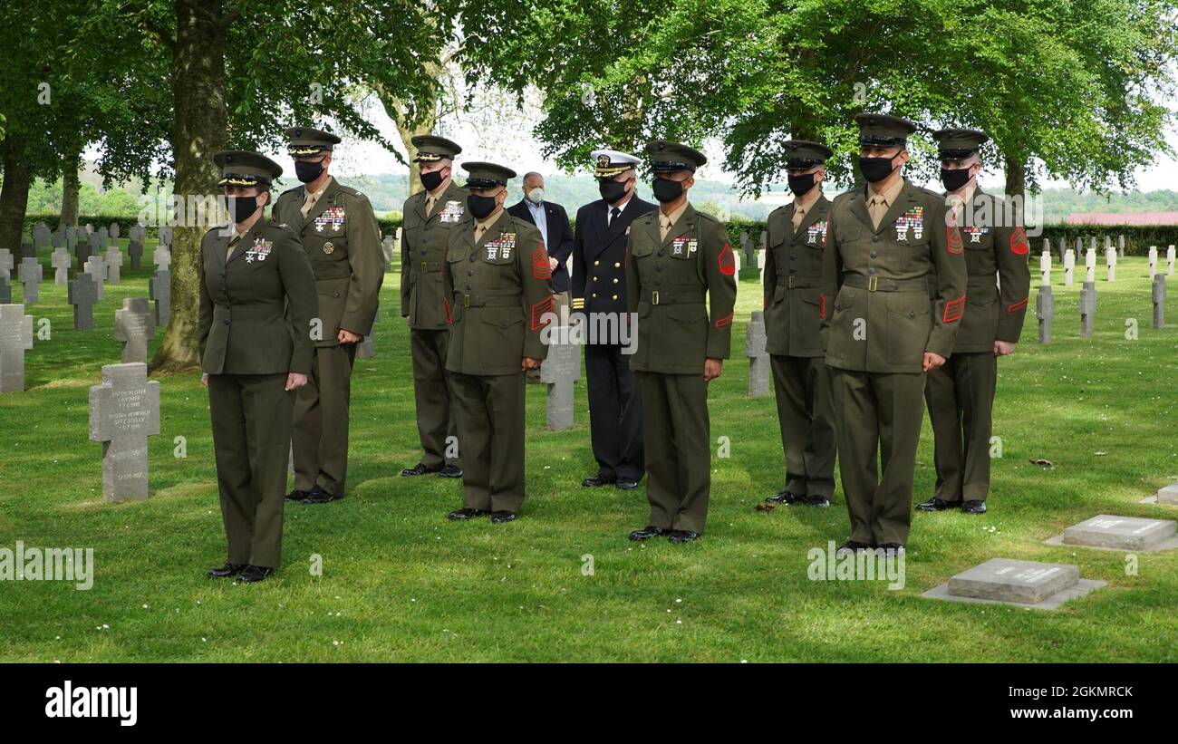 U.S. Marines stand at attention during a wreath laying ceremony at the ...