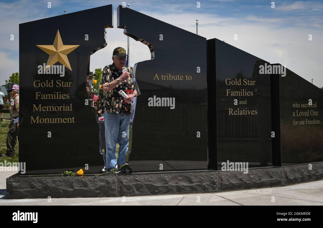 A Vietnam veteran prays at the Gold Star Families Memorial Monument at ...