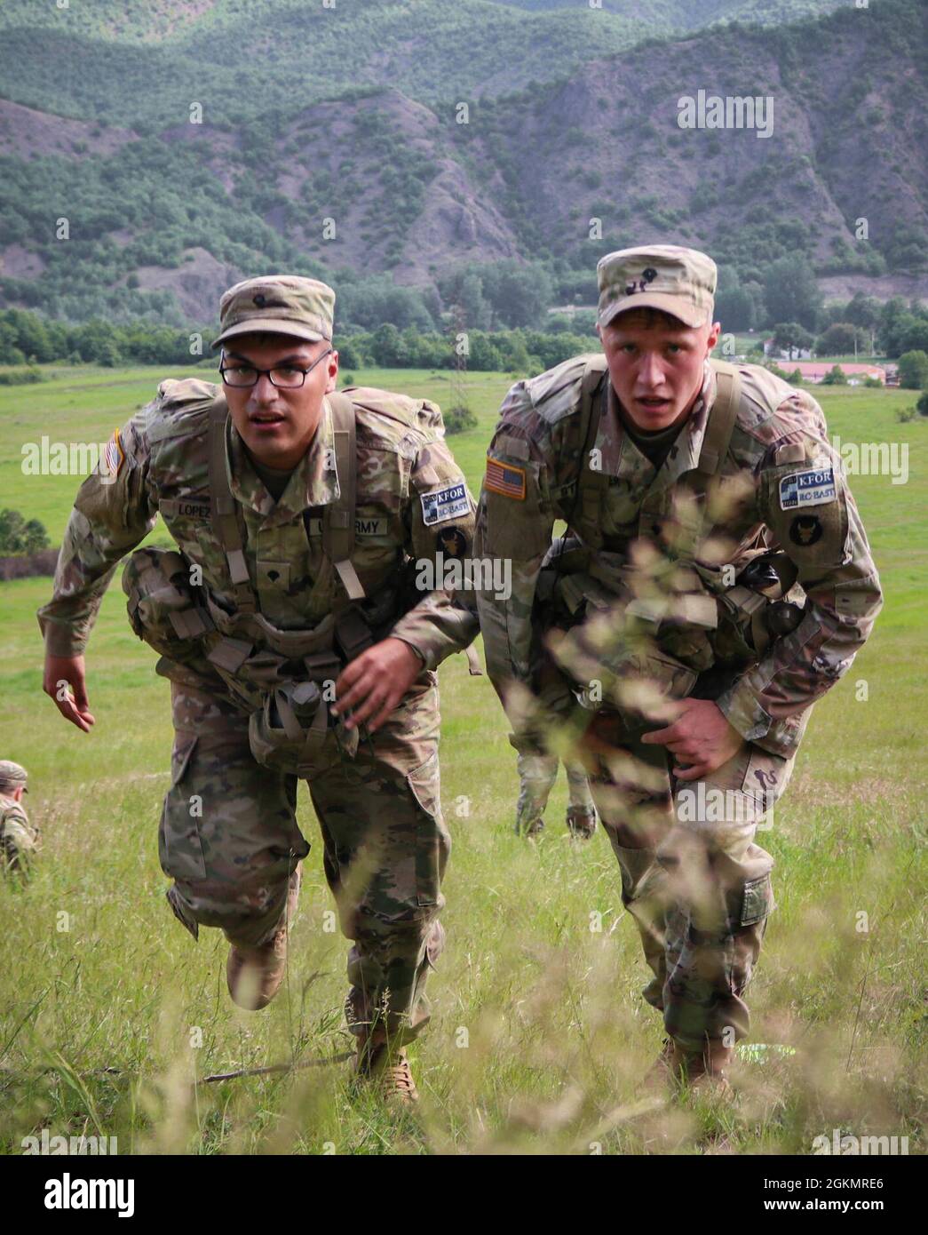 Iowa Army National Guard Soldiers demonstrate a tactical sprint during ...