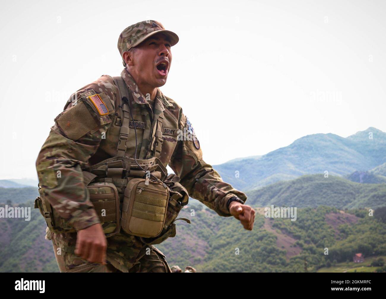 An Iowa Army National Guard Soldier demonstrates a tactical sprint ...