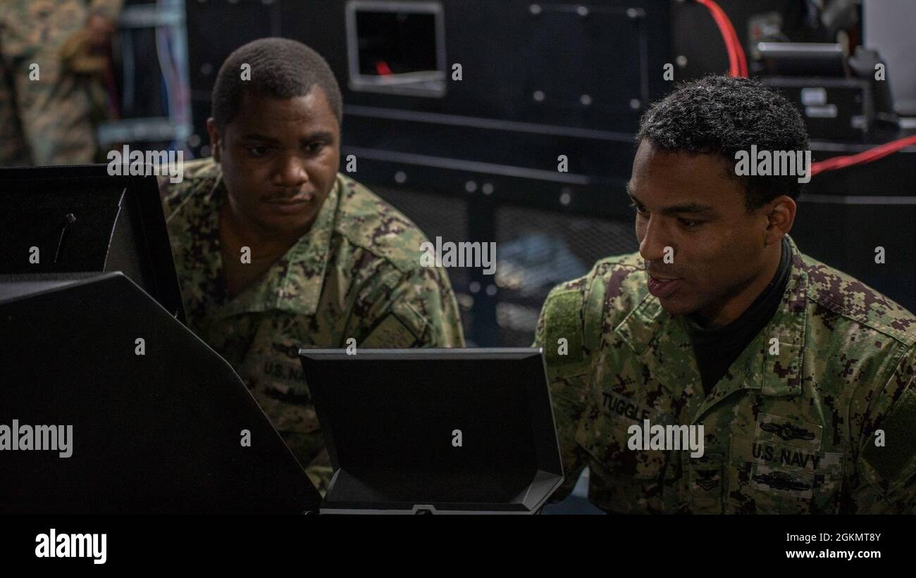 210530-M-BY673-0023 ATLANTIC OCEAN (May 30, 2021) From left to right ...