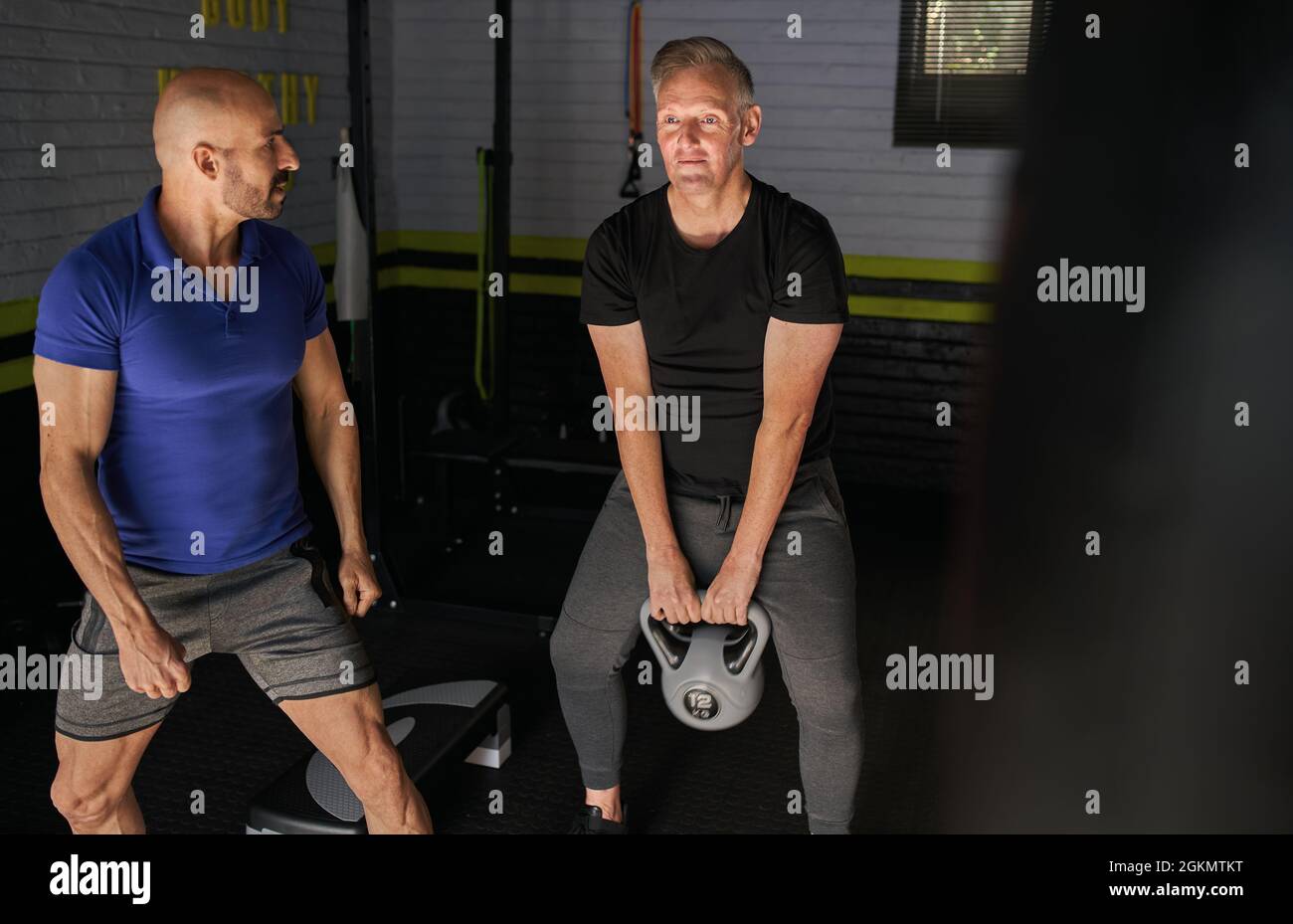 Male gym instructor hi-res stock photography and images - Alamy