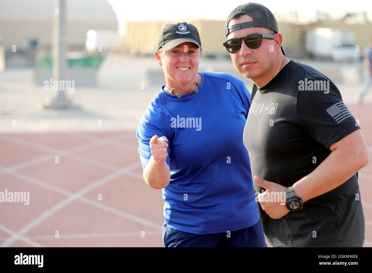 Maj. Tiffany Gilmartin, left, and Sgt. Fernando Lopeziniguez get caught ...