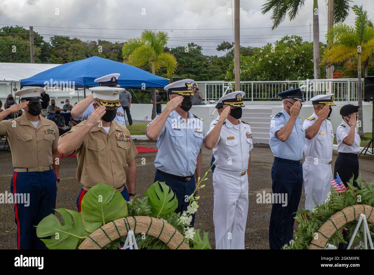 Guam military leaders pay their respects during a wreath laying at the ...