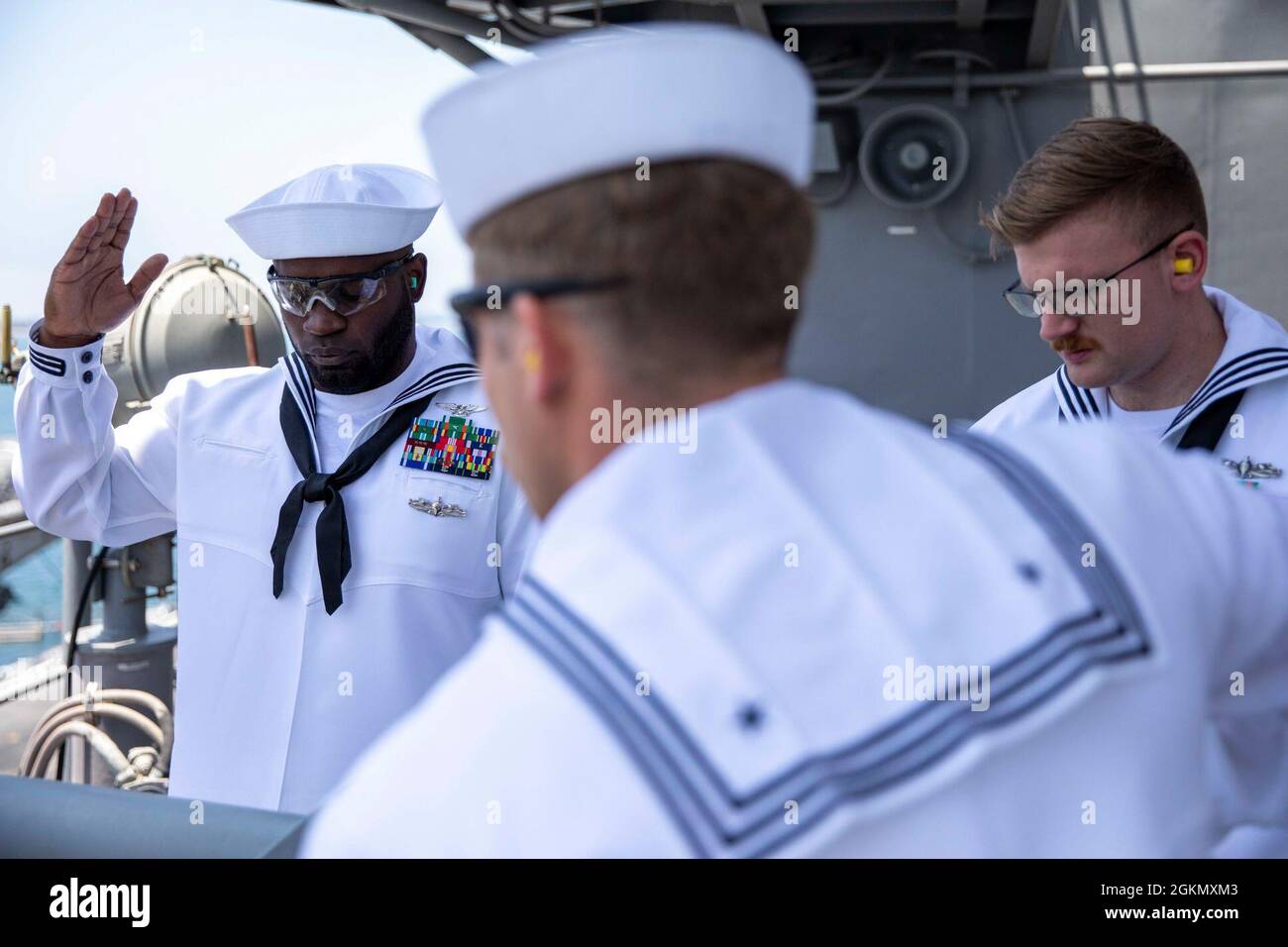 210531-N-AO823-1074 SAN DIEGO (May 31, 2021) – Sailors prepare to fire ...