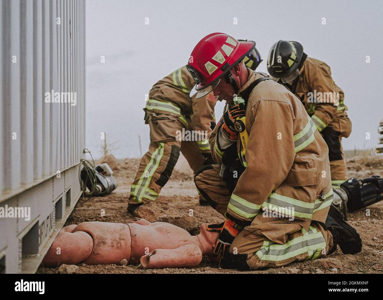 The 776th Air Expeditionary Air Base Squadron firefighters remove a ...