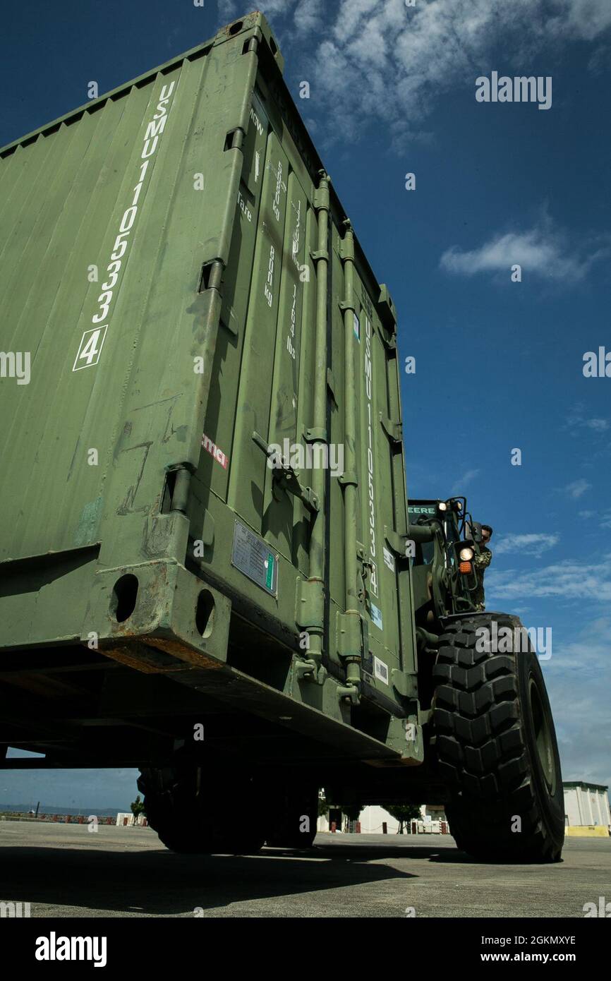 U.S. Marine Corps Lance Cpl. Nathan Welch, a heavy equipment operator ...