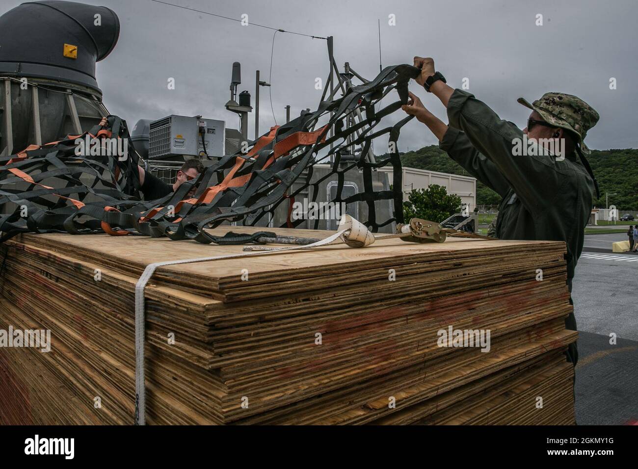 U.S. Navy BM2 Truong Le, boatswain’s mate with Naval Beach Unit (NBU) 7 ...