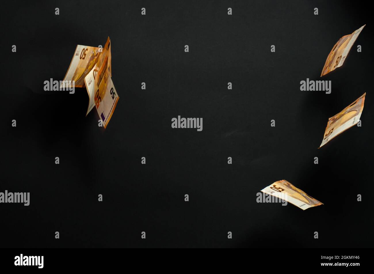 European banknotes on a black background, rain of money, human ...