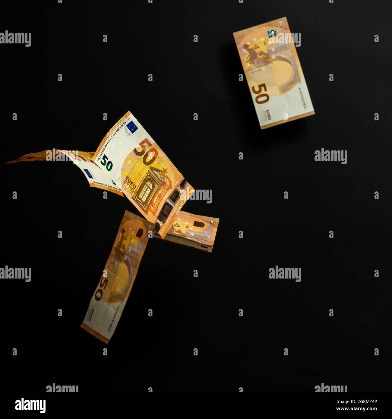 Rain with euros, European currency on a black background, winning the ...