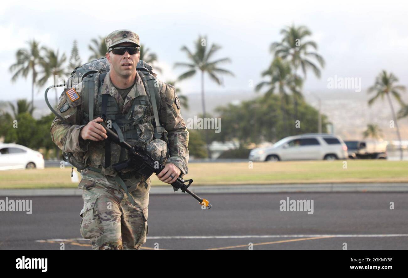 Staff Sgt. Jason Rader, a cyber network defender assigned to 94th Army ...