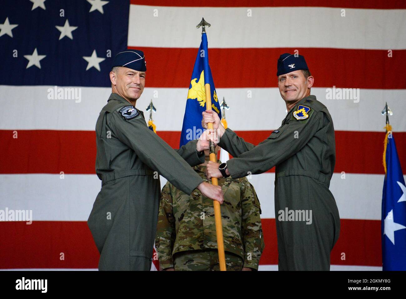 Lt. Gen. Scott Pleus, Seventh Air Force commander, presents the ...