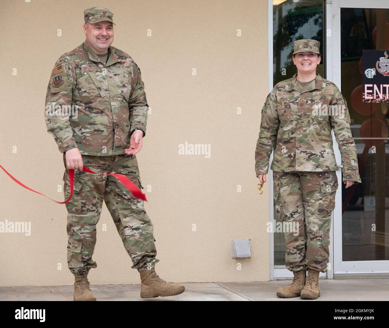 Col. Mark Dmytryszyn, 2nd Bomb Wing commander, and Maj. Jennifer ...